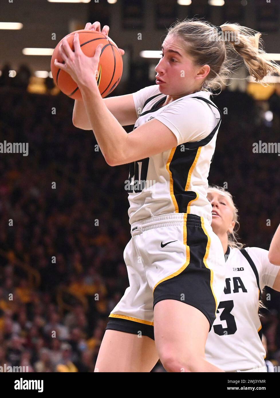 IOWA CITY, IA - FEBRUARY 08: Iowa guard Kate Martin (20) grabs a ...