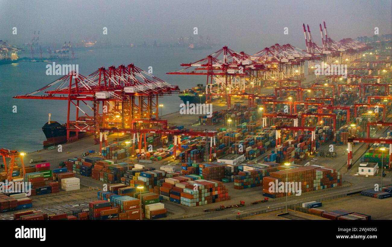 QINGDAO, CHINA - FEBRUARY 12, 2024 - Container loading and unloading at ...