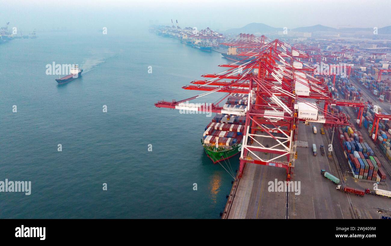 QINGDAO, CHINA - FEBRUARY 12, 2024 - Container loading and unloading at ...