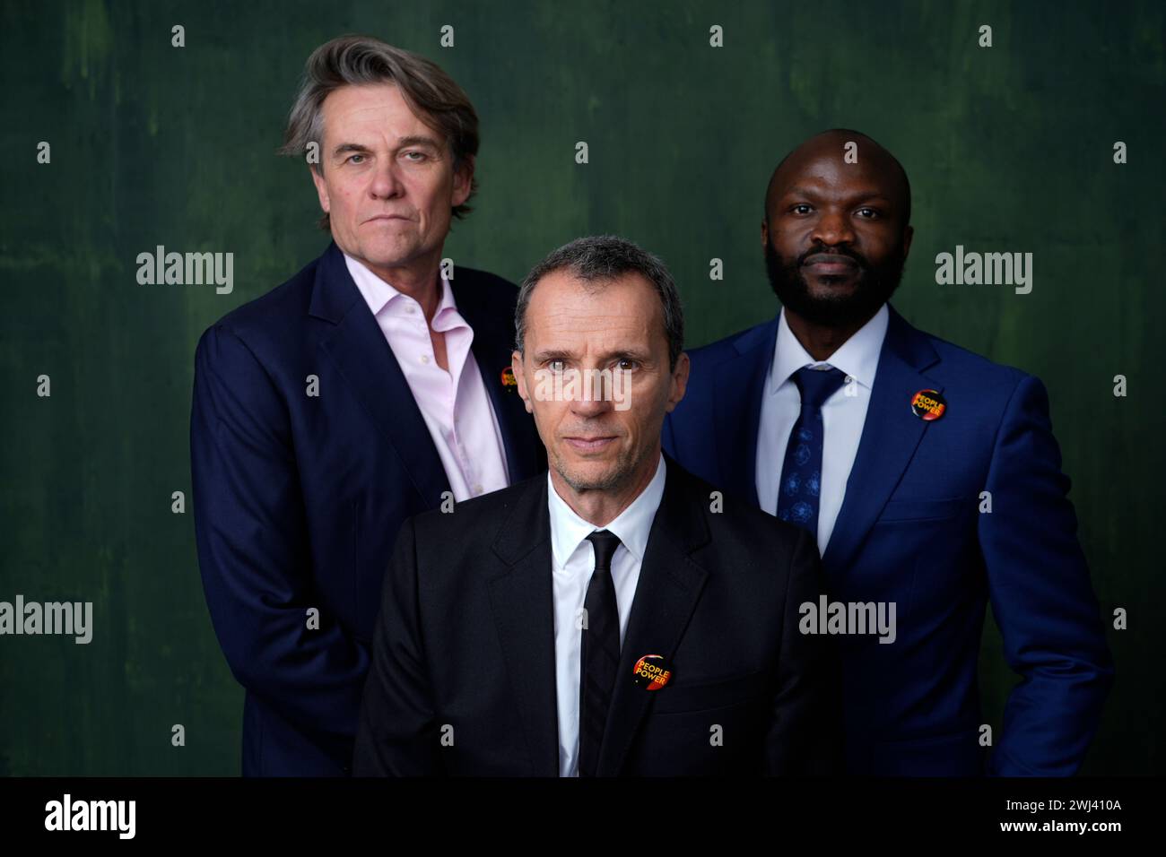 Christopher Sharp, from left, John Battsek, and Moses Bwayo pose for a ...