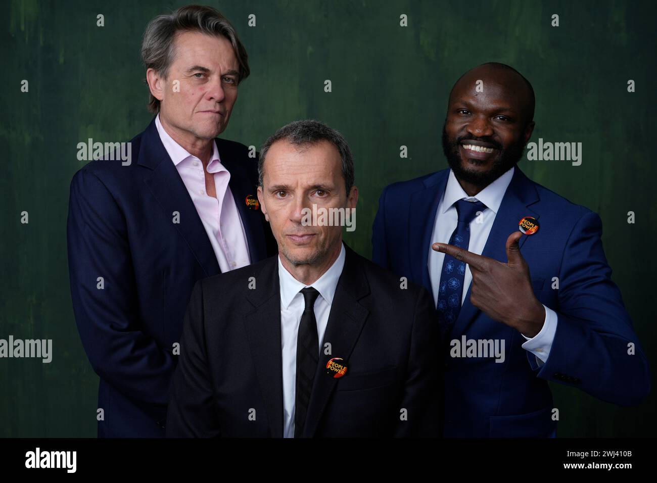 Christopher Sharp, from left, John Battsek, and Moses Bwayo pose for a ...