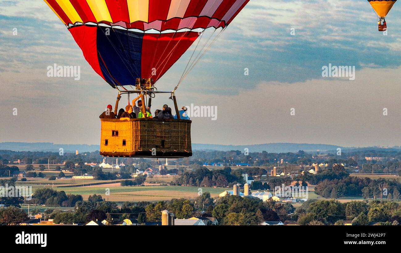 Aerial Close-up View of Hot Air Balloons Floating Away in Rural ...
