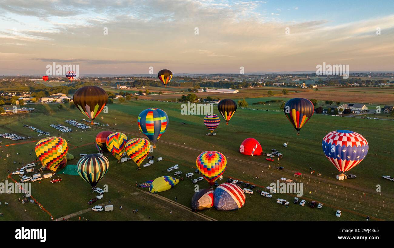 Aerial View of Multiple Hot Air Balloons Floating Up During a Morning ...