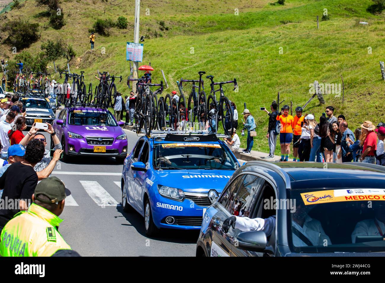 LA CALERA, COLOMBIA - FEBRUARY 11, 2024: Accompanying vehicles. Sixth ...