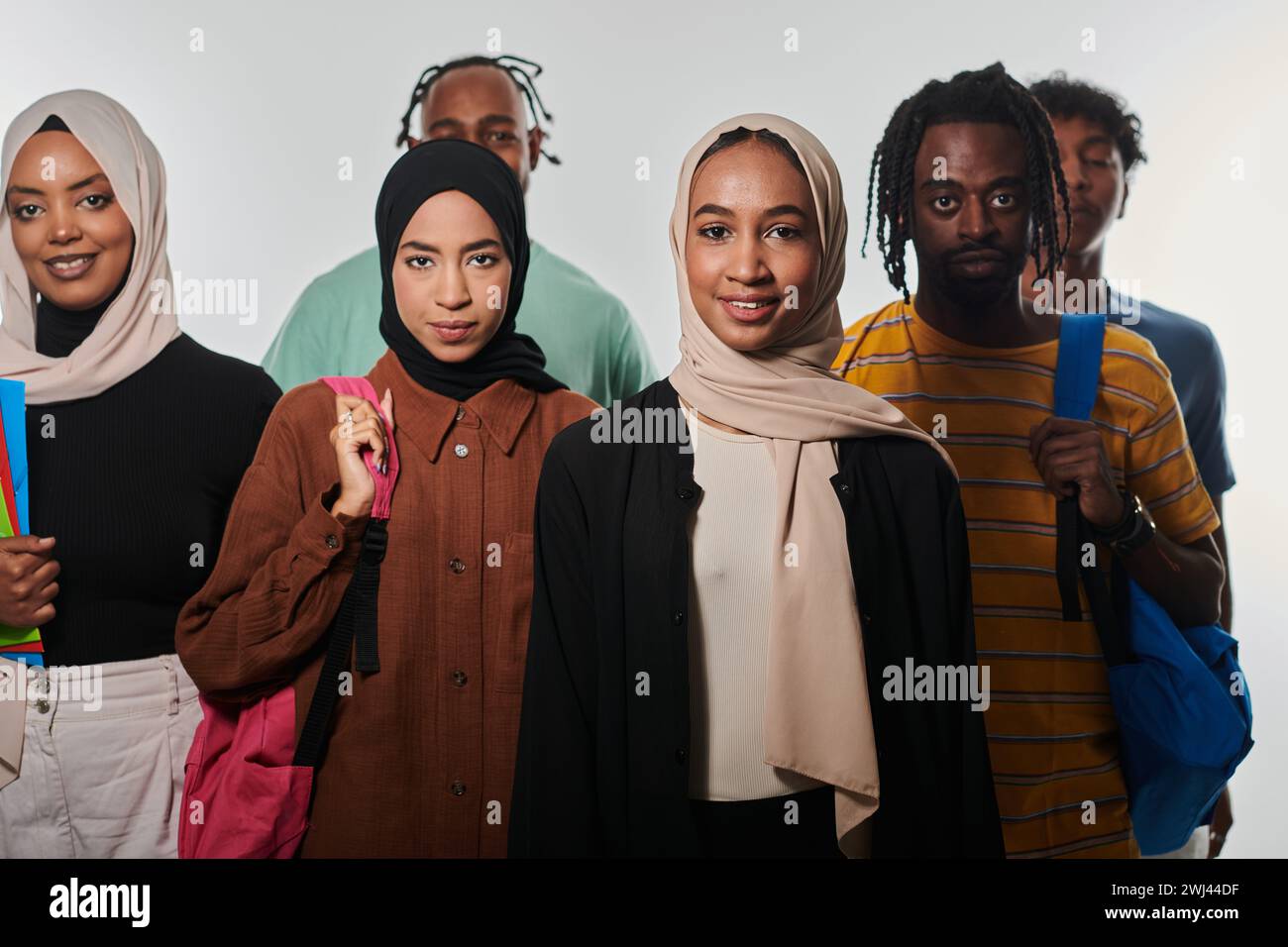 In a vibrant display of educational diversity, a group of students ...