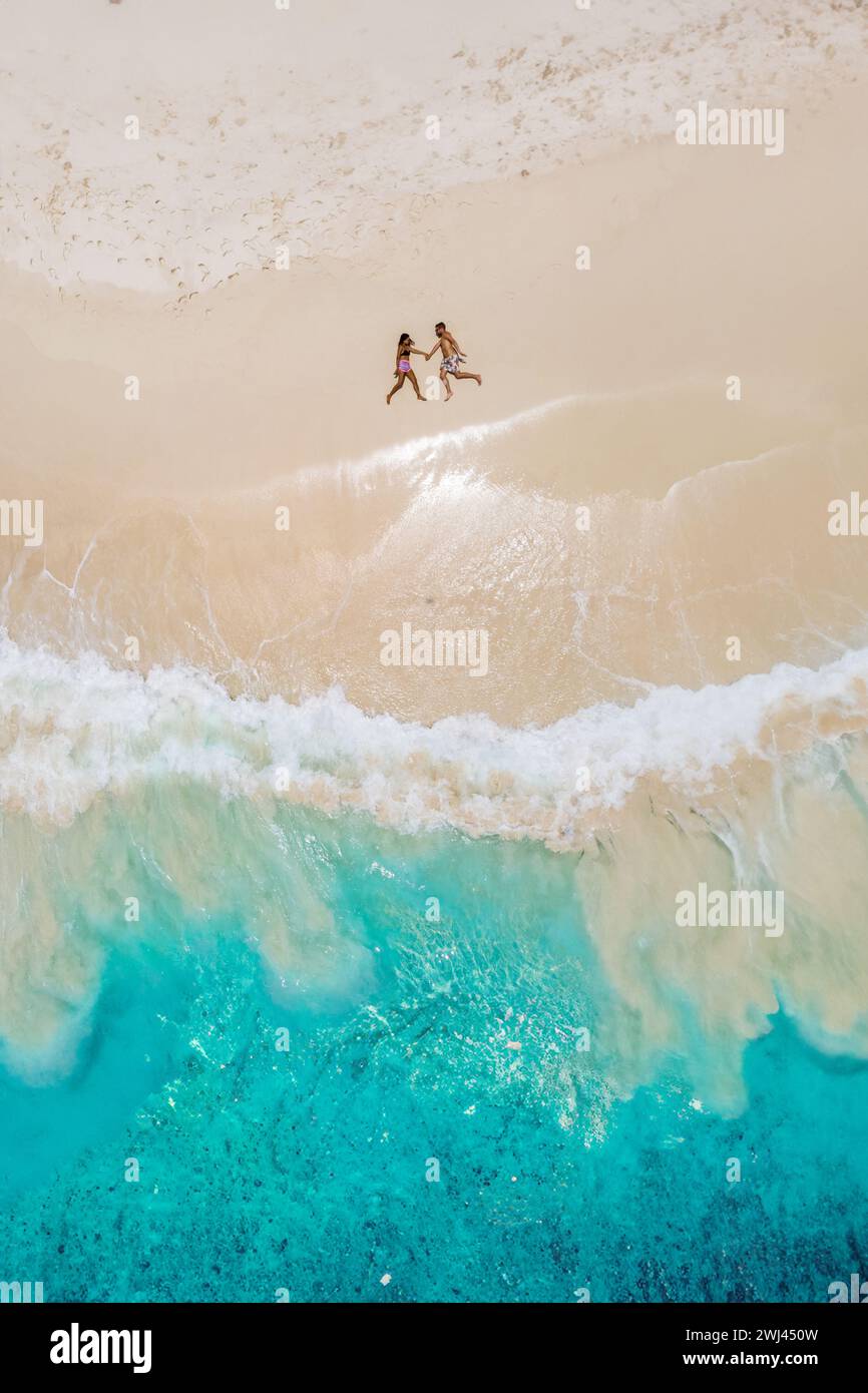 Woman laying down top view hi-res stock photography and images - Alamy
