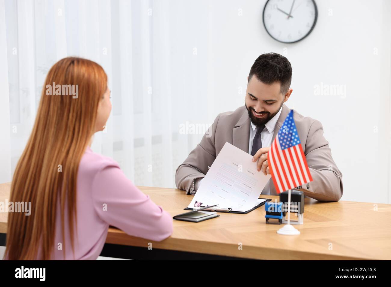 Immigration to United States of America. Embassy worker approving visa ...
