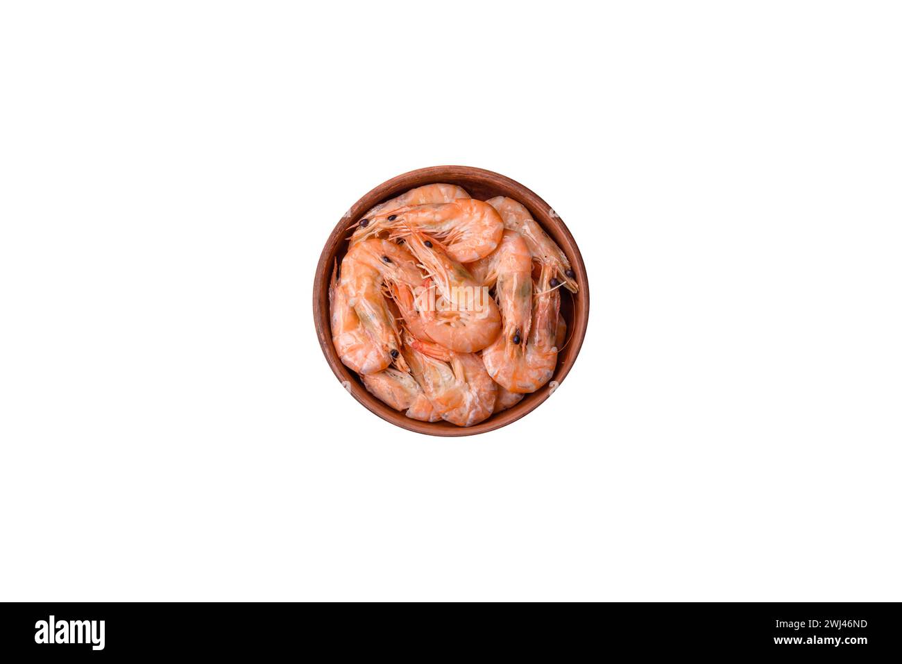 Delicious fresh boiled tiger prawns with salt and spices on a ceramic ...