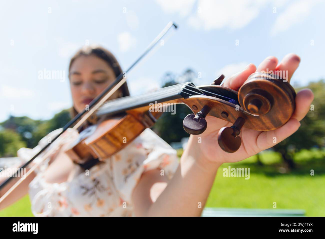 Wide angle closeup of blurred unrecognizable Caucasian young woman ...