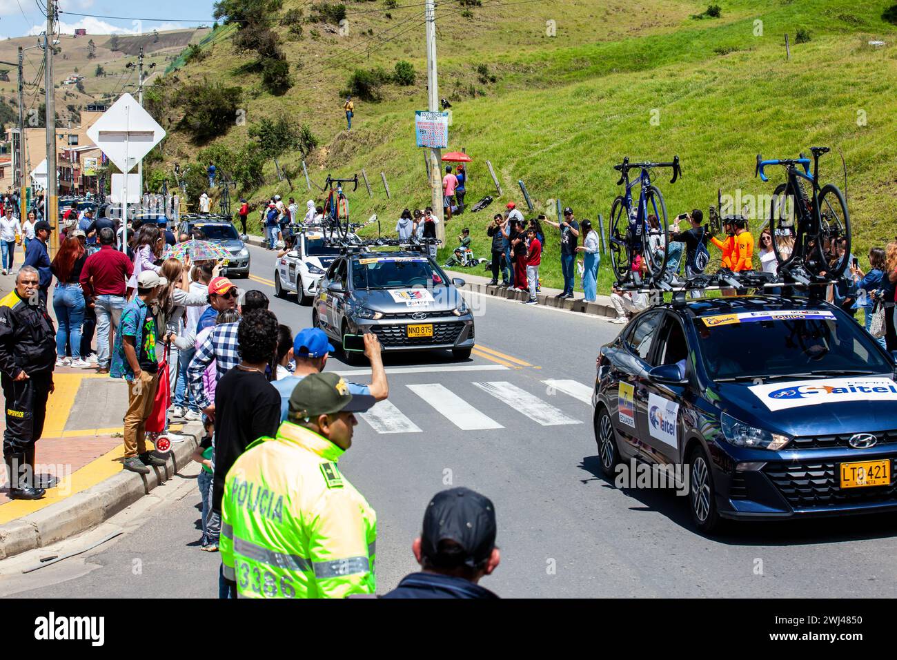 LA CALERA, COLOMBIA - FEBRUARY 11, 2024: Team accompanying vehicles ...