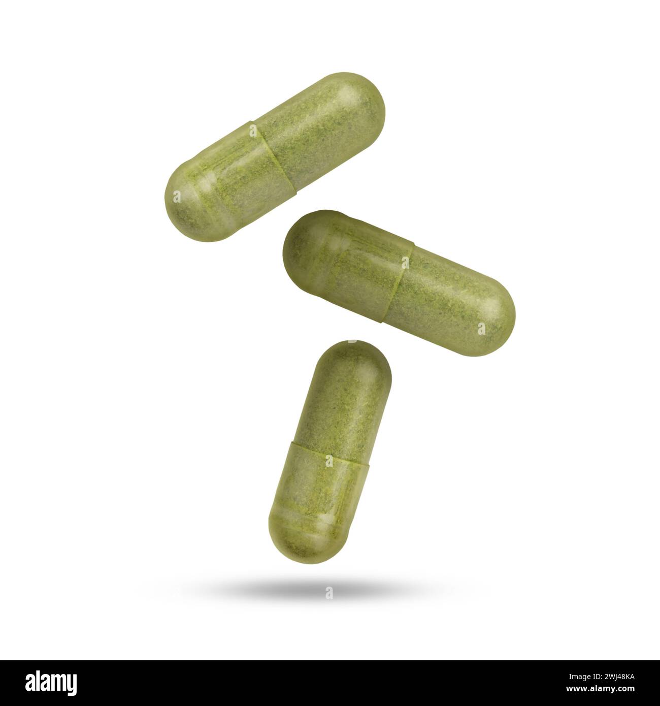 Vitamin. Many capsules falling on white background Stock Photo - Alamy