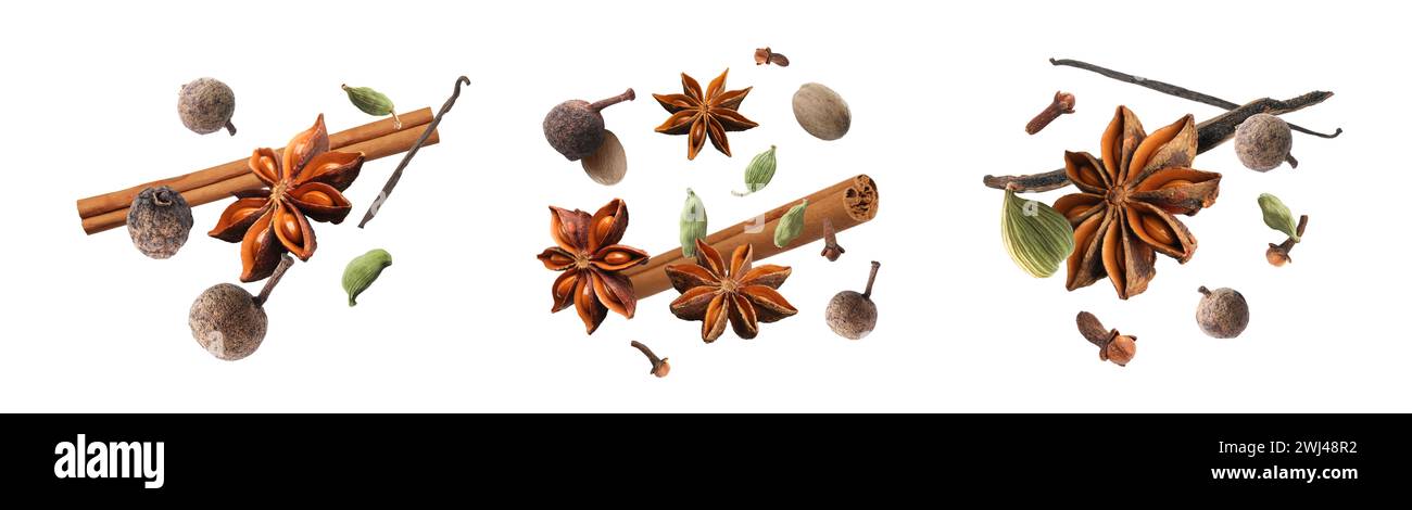Different aromatic spices falling on white background Stock Photo - Alamy
