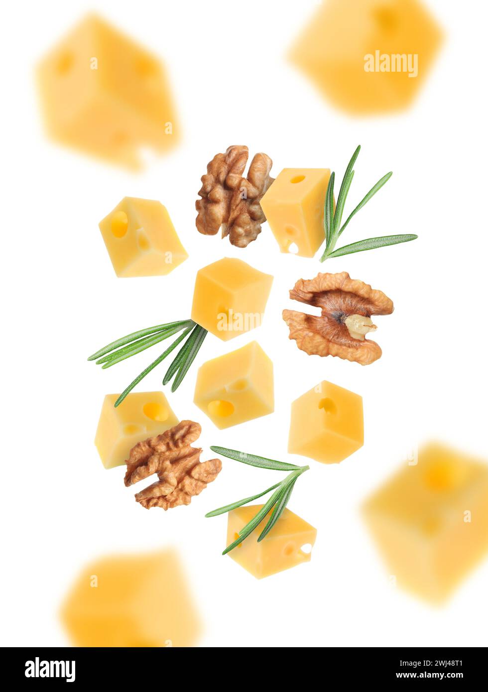 Cheese, walnuts and rosemary flying on white background Stock Photo - Alamy
