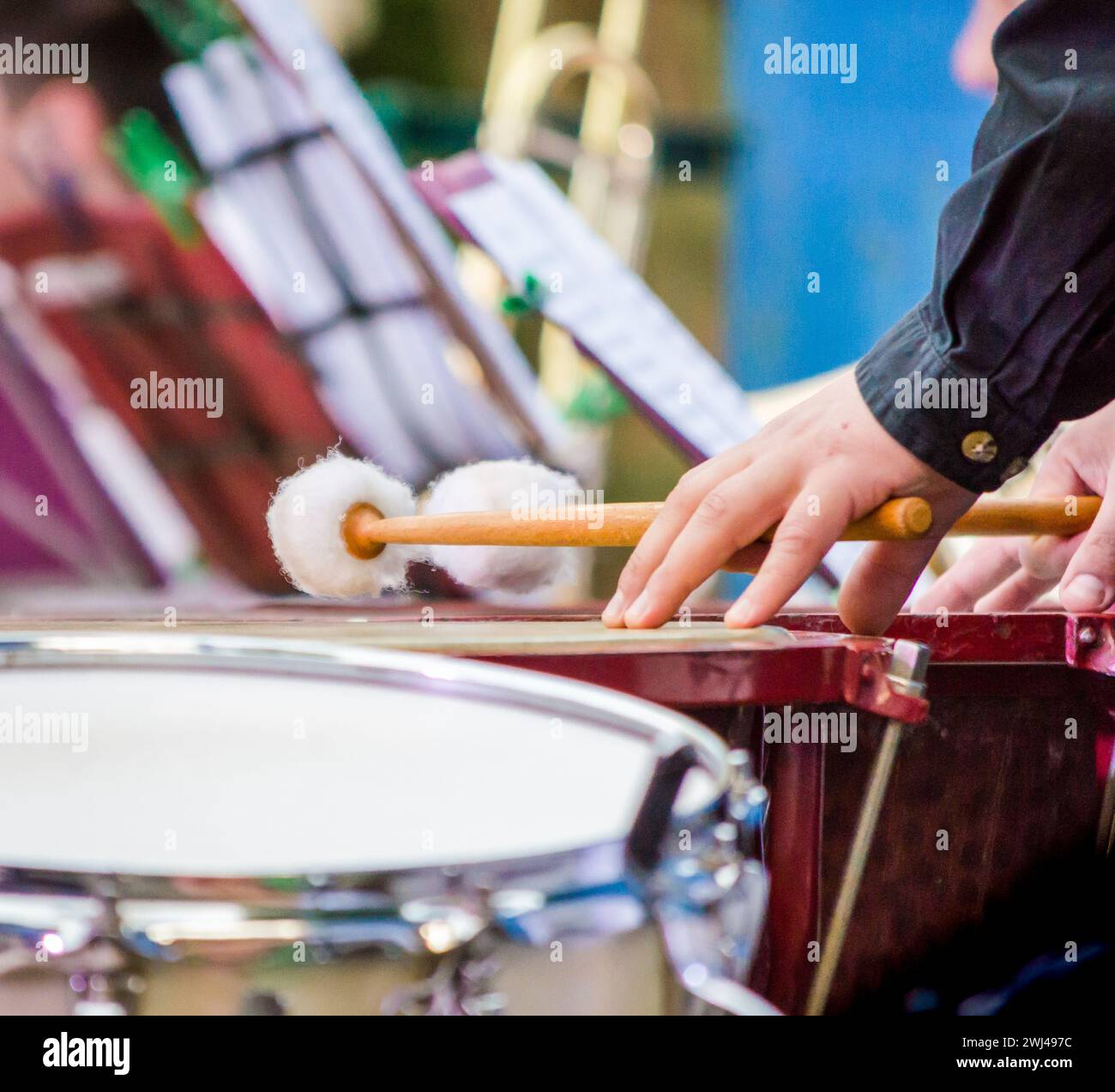 Male musician drummer hands with drumsticks and drum close up Stock ...