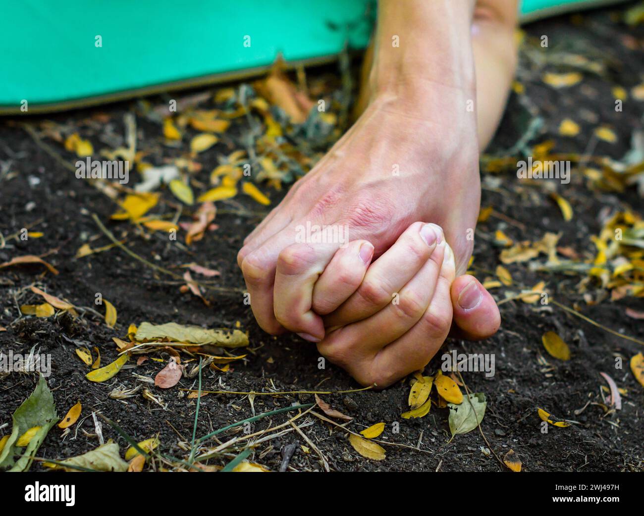 Hands on ground hi-res stock photography and images - Alamy