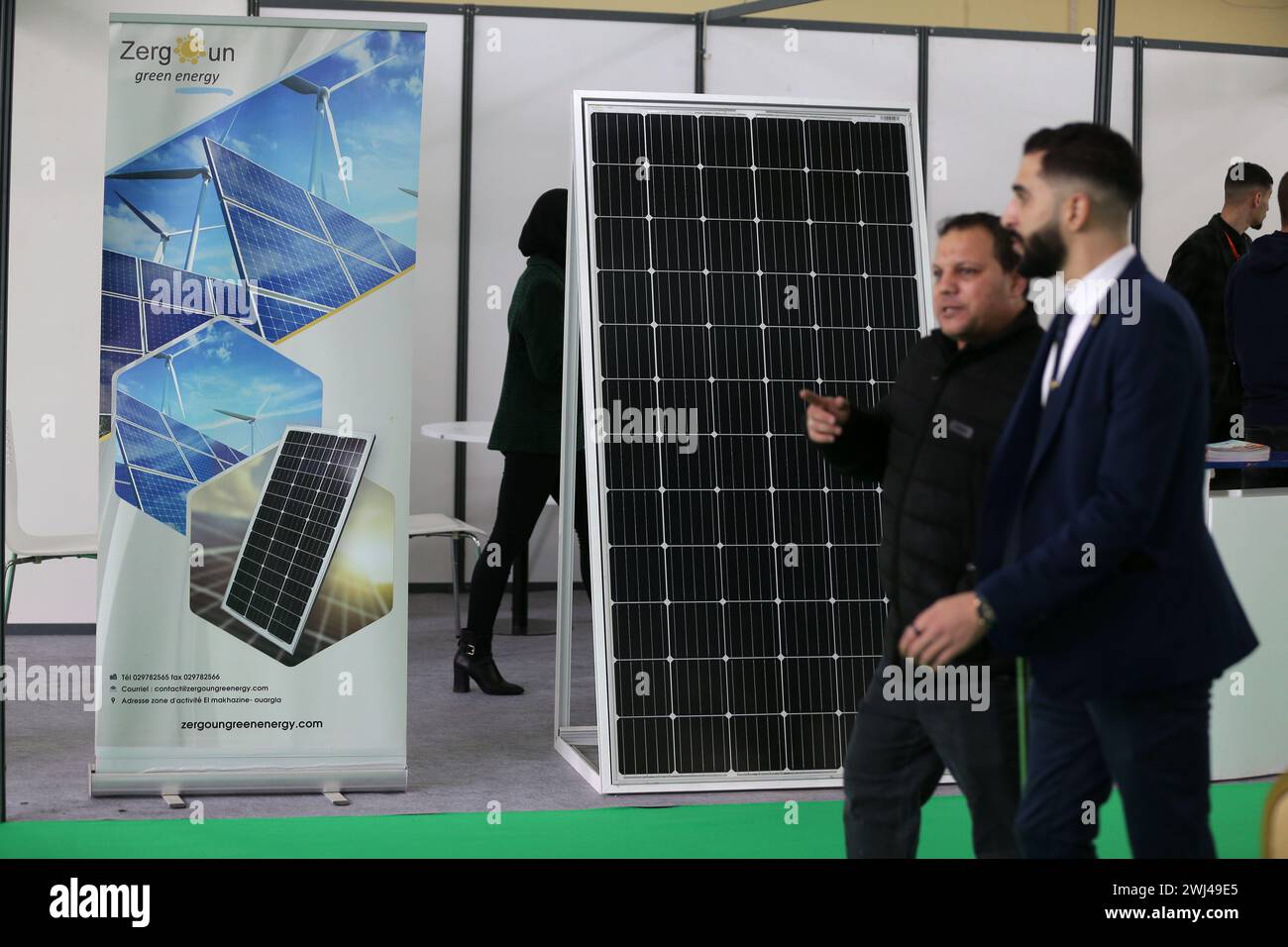Algiers. 13th Feb, 2024. People visit the International Fair of Electricity and Renewable ...