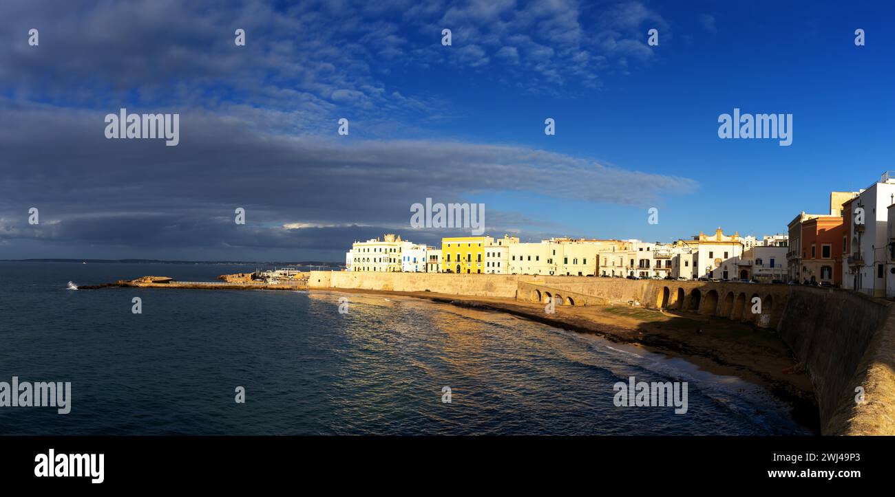 View of the waterfront of the historic old town of Gallipoli in warm ...