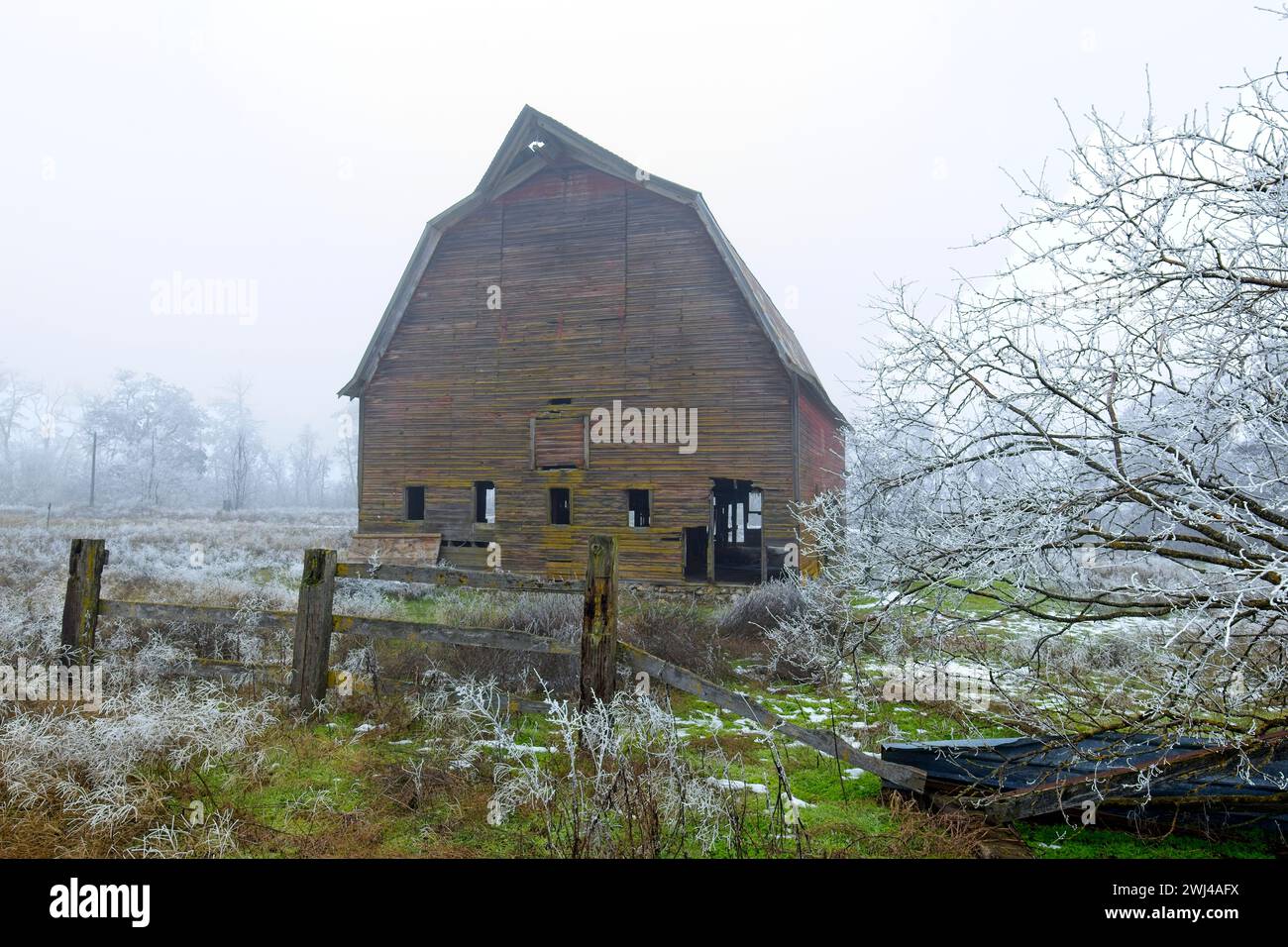 Old barn and fence in wintery Idaho Stock Photo - Alamy