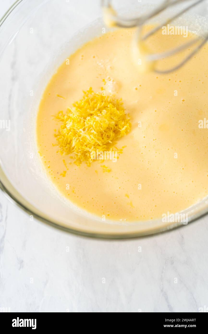 Lemon blueberry bundt cake with powdered sugar dusting Stock Photo - Alamy