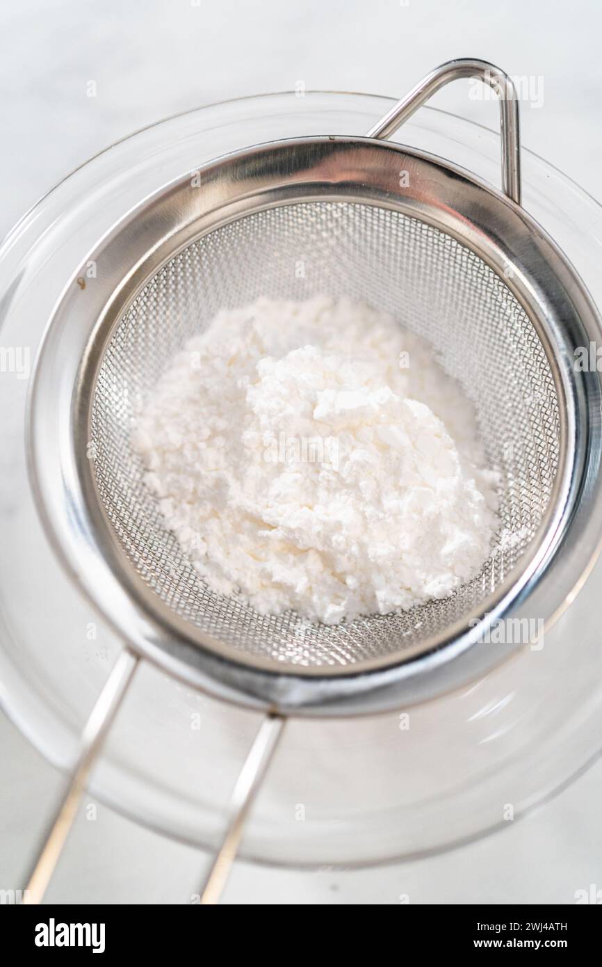 Lemon blueberry bundt cake with powdered sugar dusting Stock Photo - Alamy