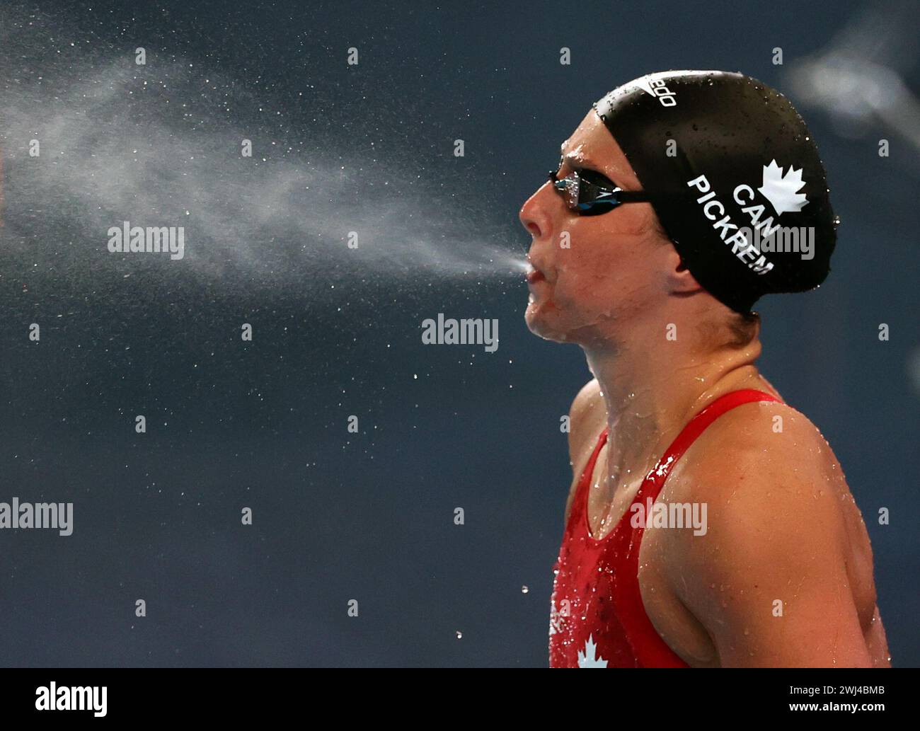 Doha, Qatar. 12th Feb, 2024. Sydney Pickrem of Canada warms up before ...