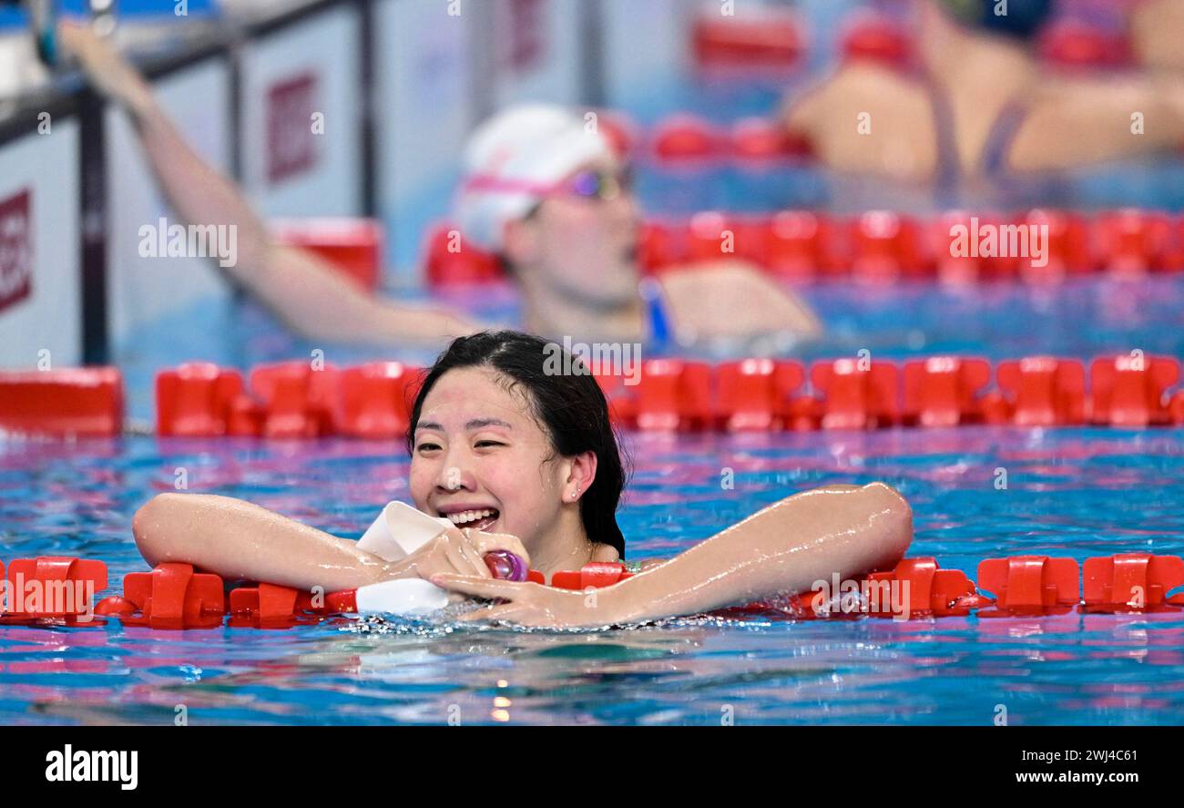 Doha, Qatar. 12th Feb, 2024. Tang Qianting of China reacts after the ...
