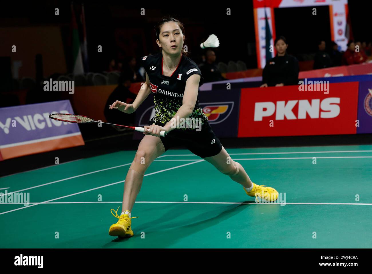 Japan's Aya Ohori plays a shot against Singapore's Yeo Jia Min during their women's singles ...