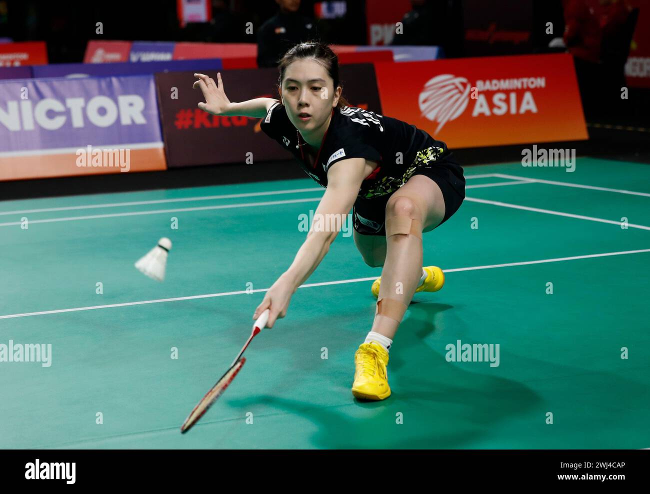 Japan's Aya Ohori plays a shot against Singapore's Yeo Jia Min during their women's singles ...