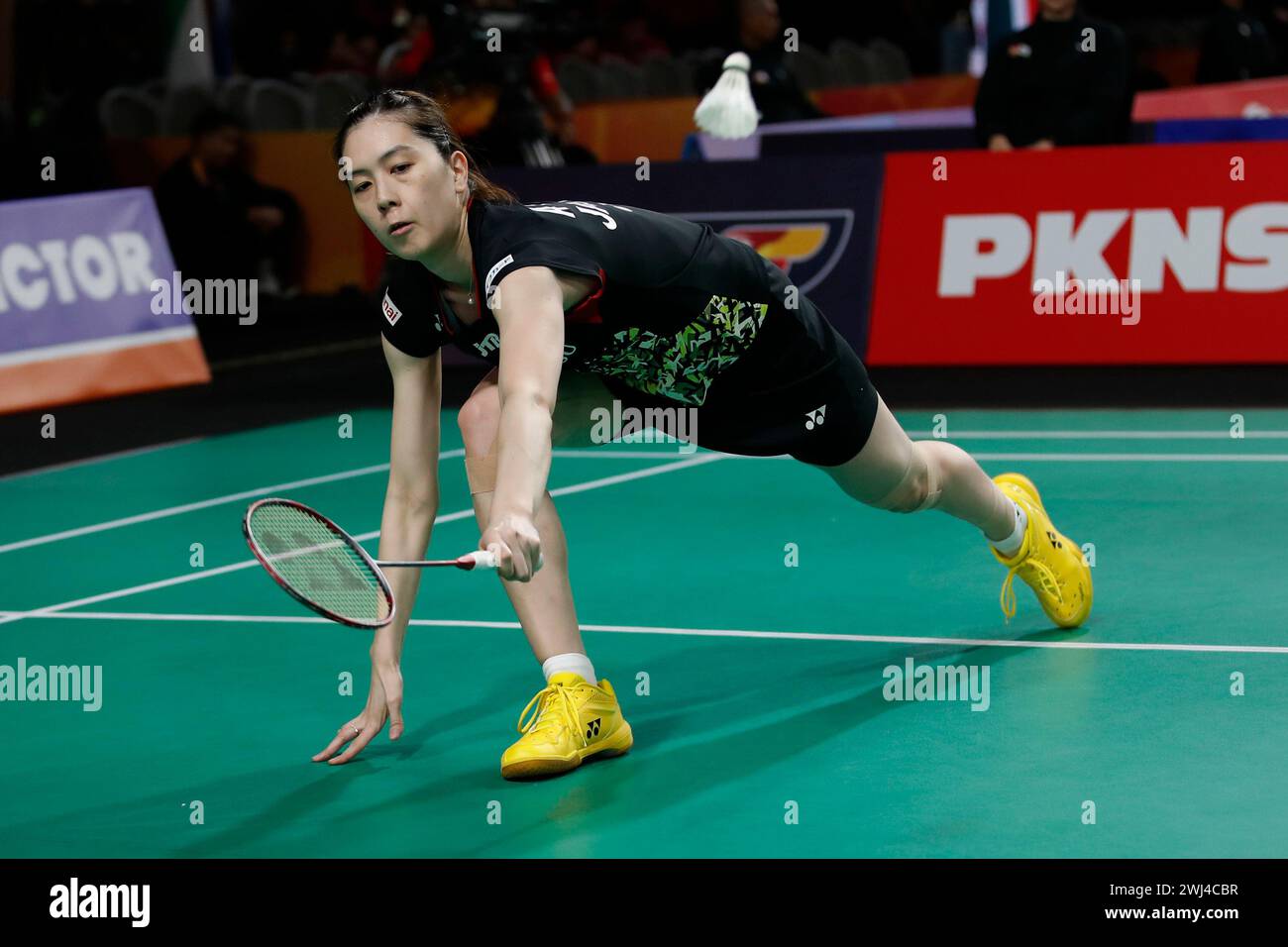 Japan's Aya Ohori plays a shot against Singapore's Yeo Jia Min during their women's singles ...