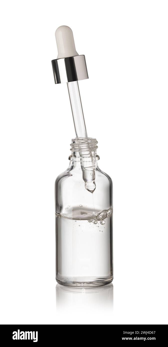 Drop falls from a pipette into a cosmetic bottle Stock Photo - Alamy