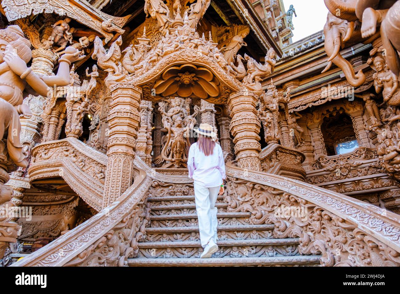 The Sanctuary of Truth wooden temple in Pattaya Thailand, sculpture of ...