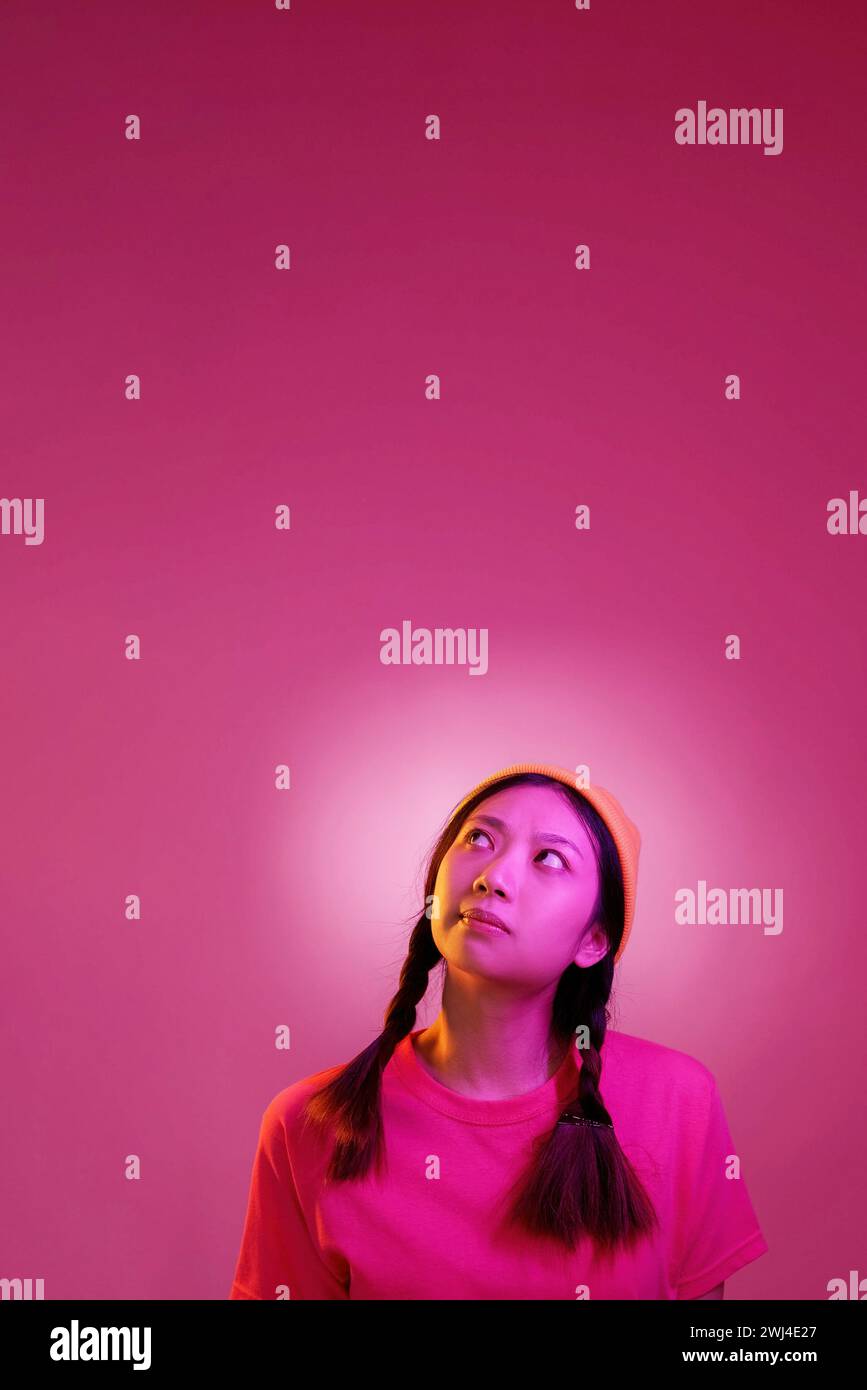 Bright thought solution woman looking up insight Stock Photo - Alamy
