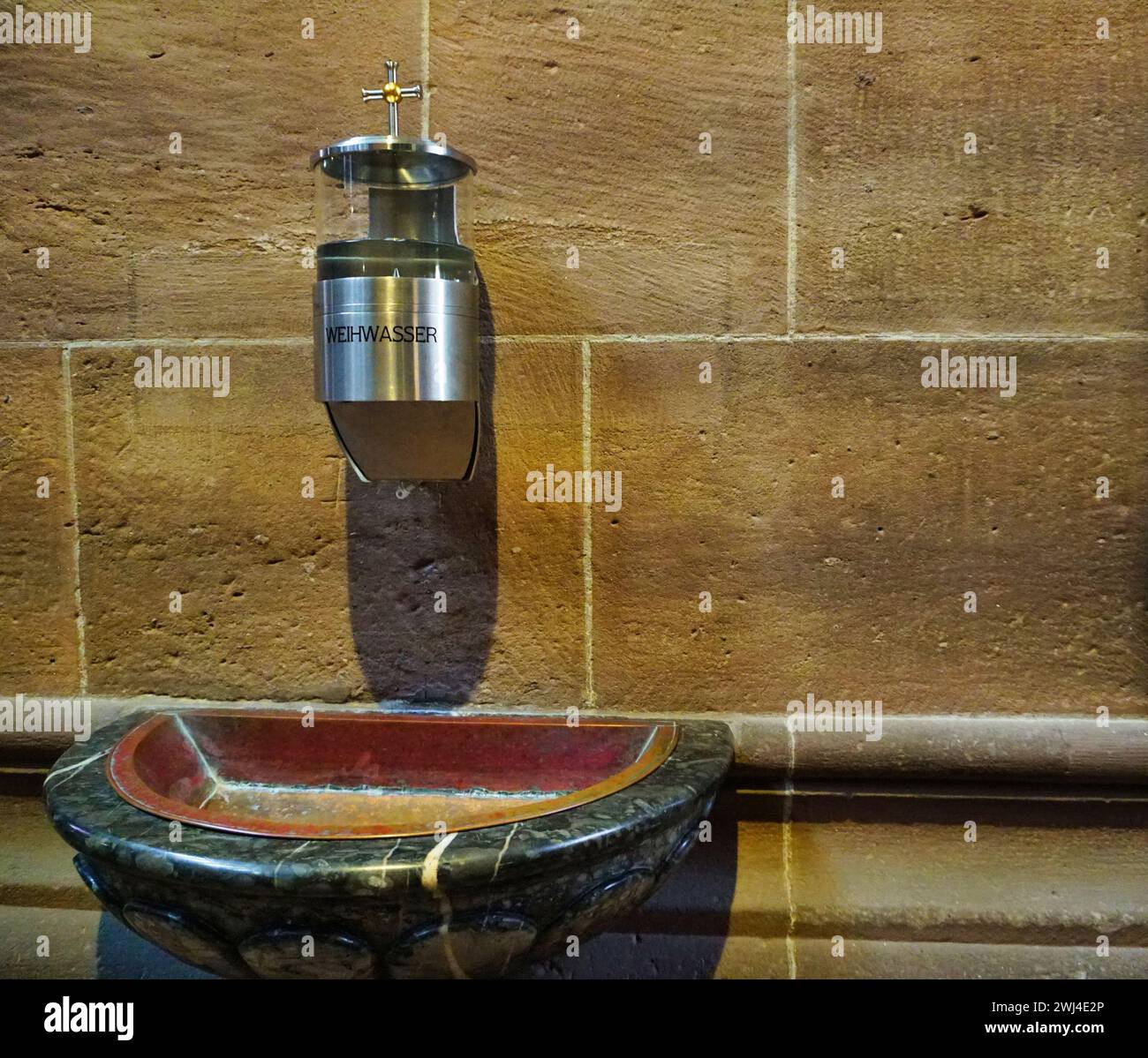 Holy water dispenser in Worms Cathedral Stock Photo - Alamy