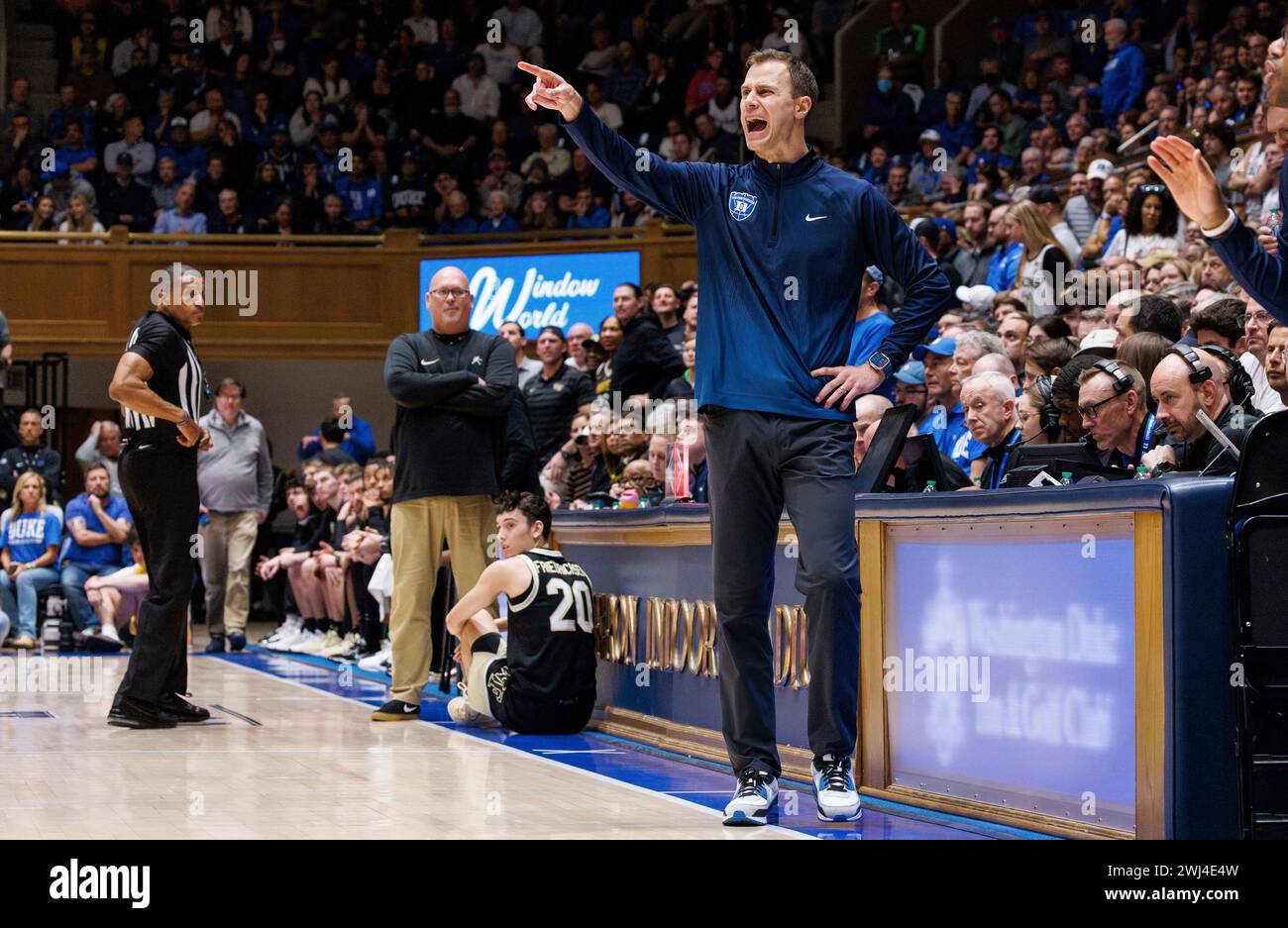 Duke head coach Jon Scheyer, front right, directs his team during the ...