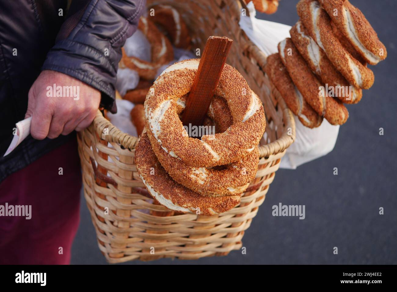 men hand pick Turkish Bagel Simit selling in a van Stock Photo - Alamy