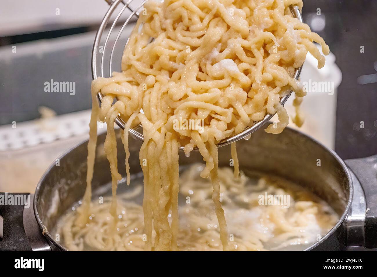 Preparation of SpÃ¤tzle - Spaetzle, a Swabian type of noodle ...