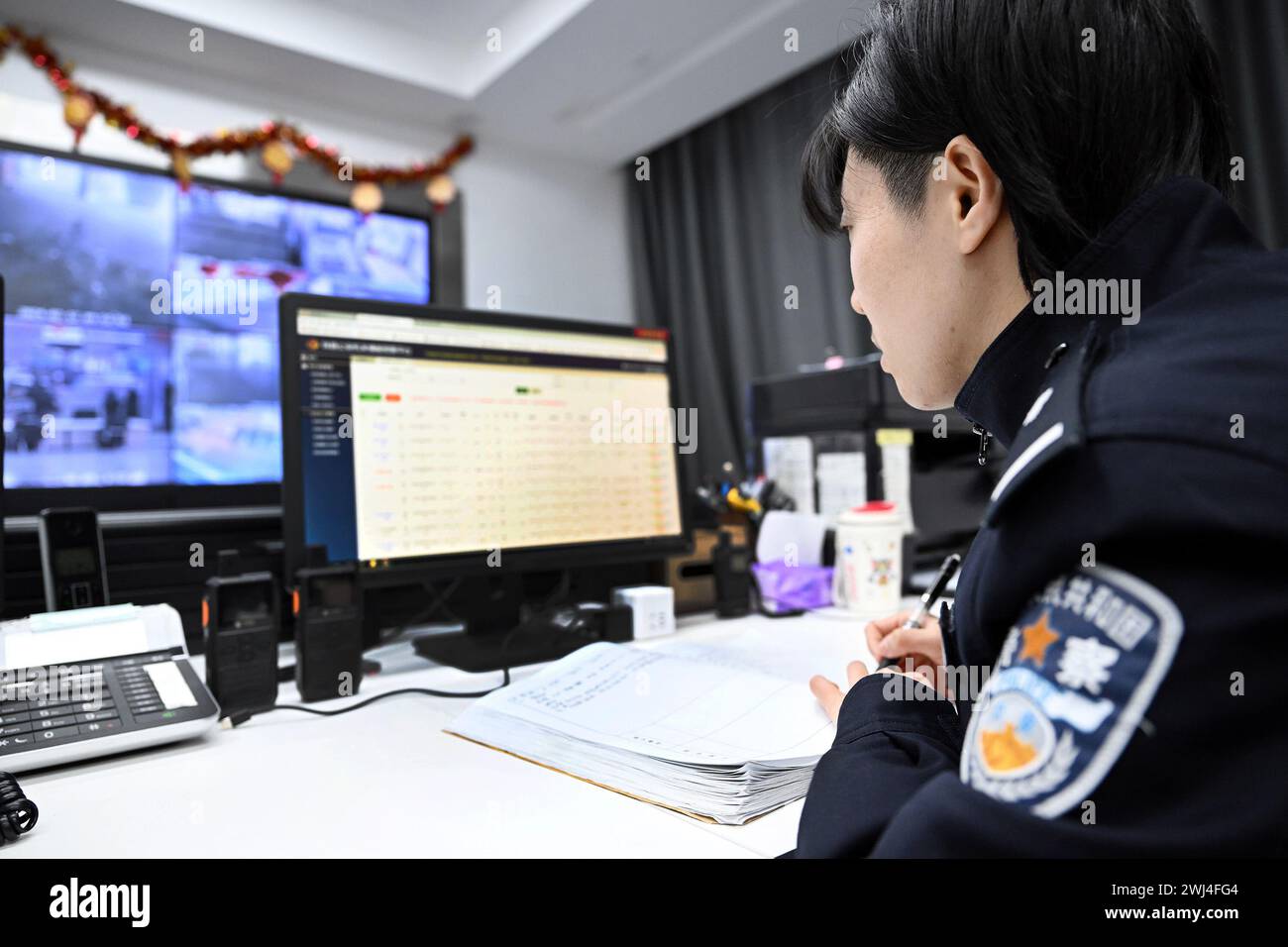 Monitoring officer hi-res stock photography and images - Alamy