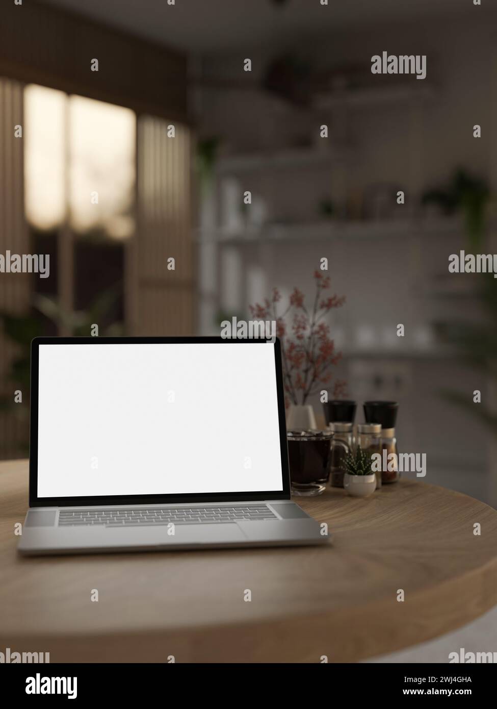 Close-up image of a white-screen laptop computer mockup on a wooden ...