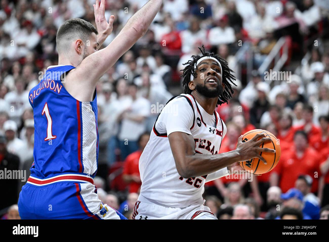 Texas Tech forward Warren Washington attempts to shoot against Kansas ...