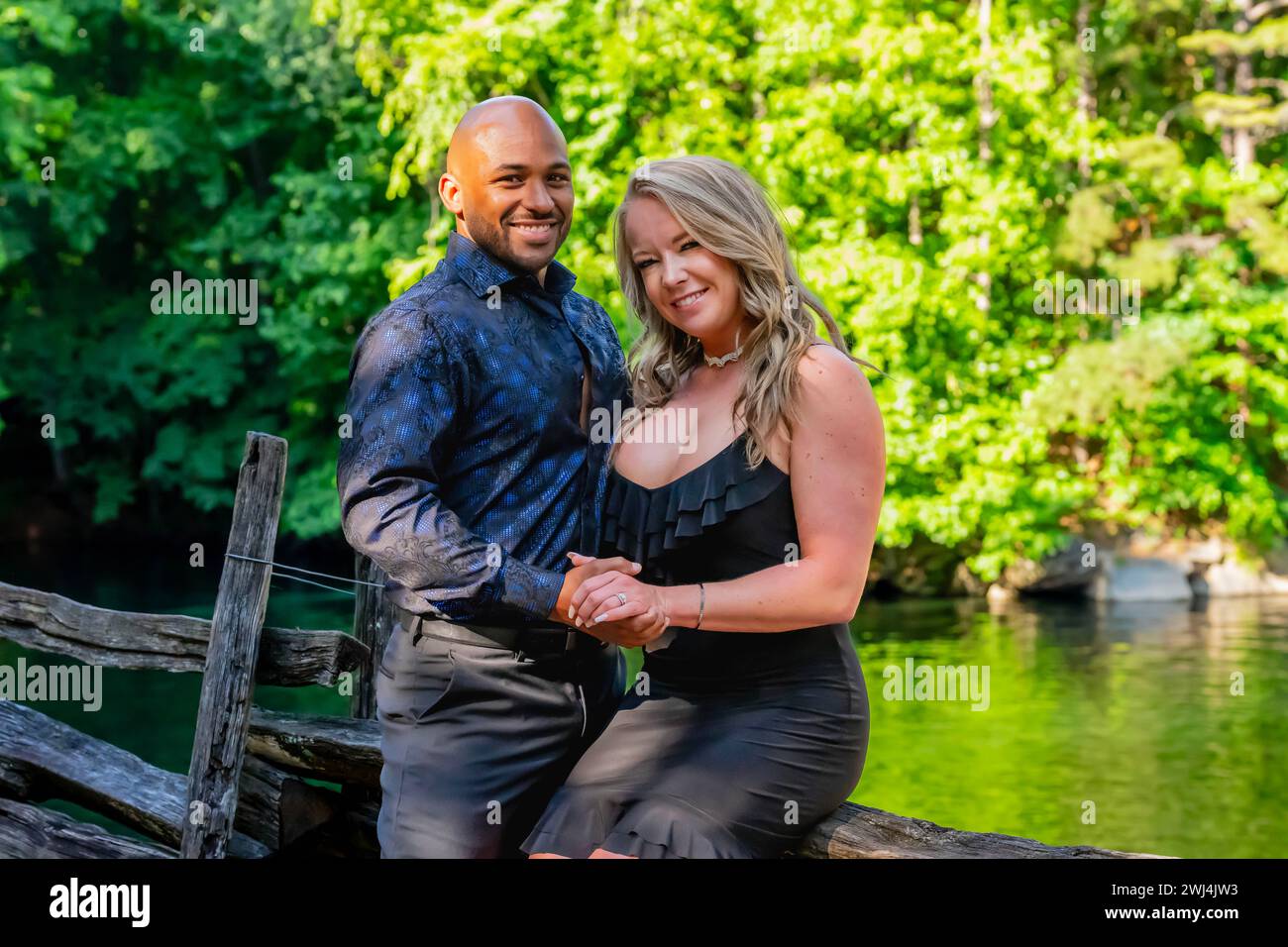A Beautiful Young Interracial Couple Pose For Their Engagement ...