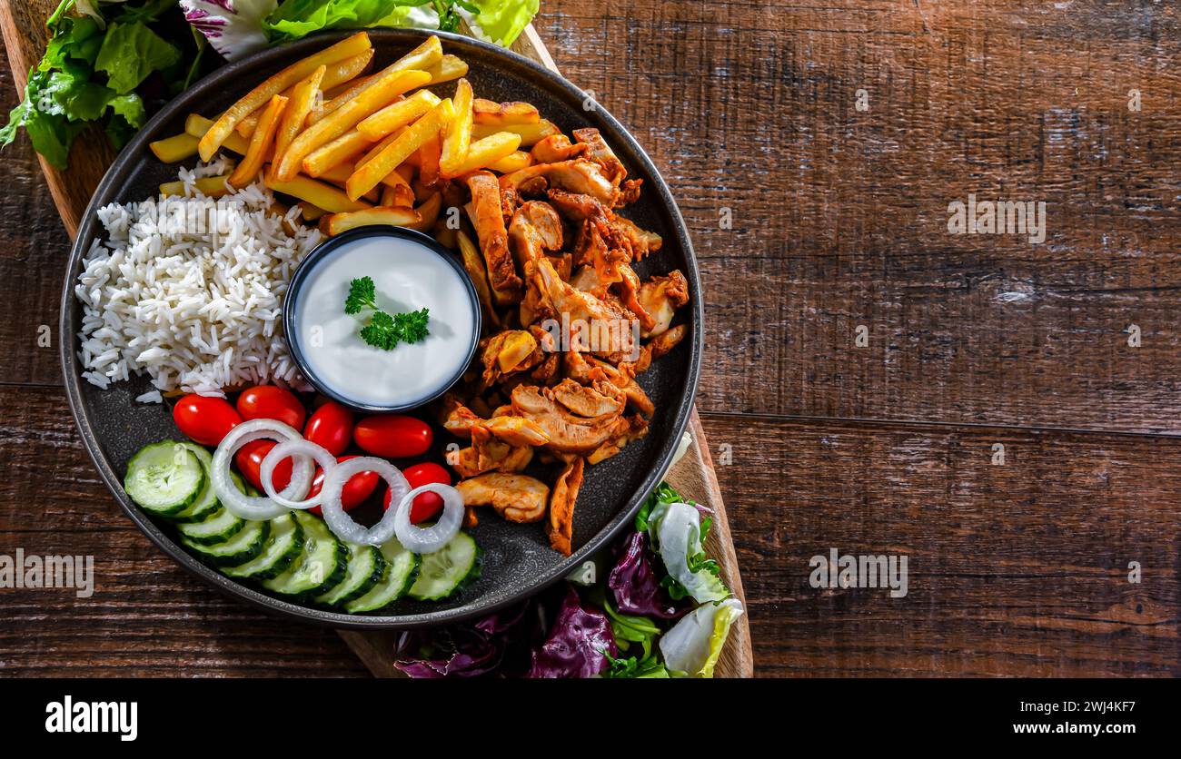 Kebab served with rice Stock Photo - Alamy
