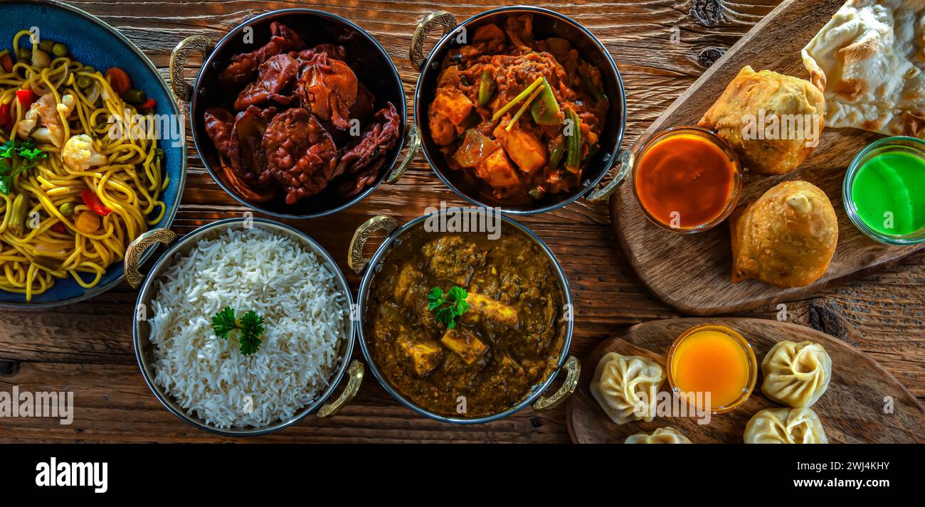 Composition with indian dishes: samosa Stock Photo - Alamy