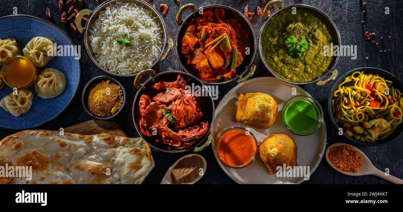 Composition with indian dishes: samosa Stock Photo - Alamy