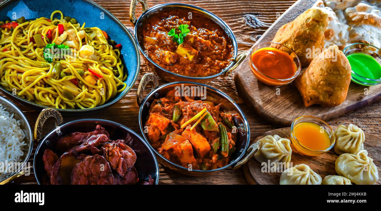 Composition with indian dishes: samosa Stock Photo - Alamy