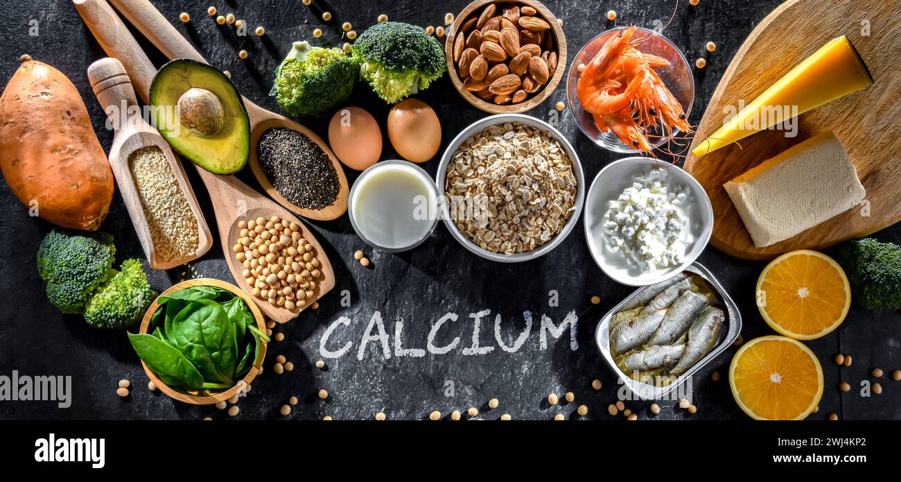 Composition with food products rich in calcium Stock Photo - Alamy