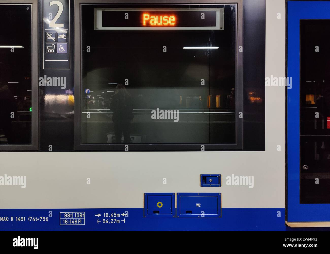Break, illuminated sign on a local train at the main station in the ...