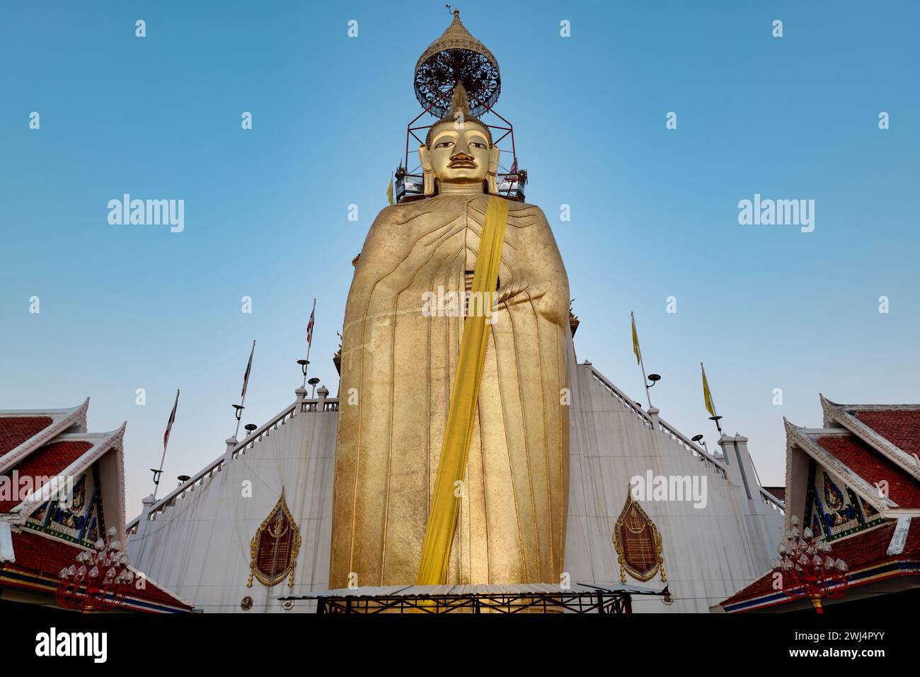 The 32 m high golden statue of a standing Buddha and a major Bangkok ...