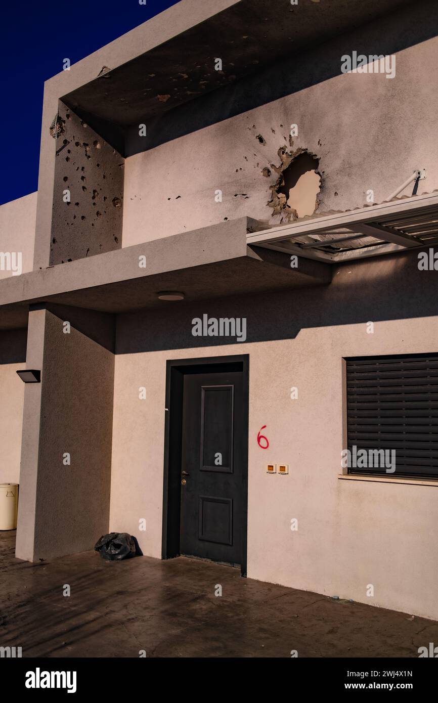 A building displaying bullet holes on its facade Stock Photo - Alamy