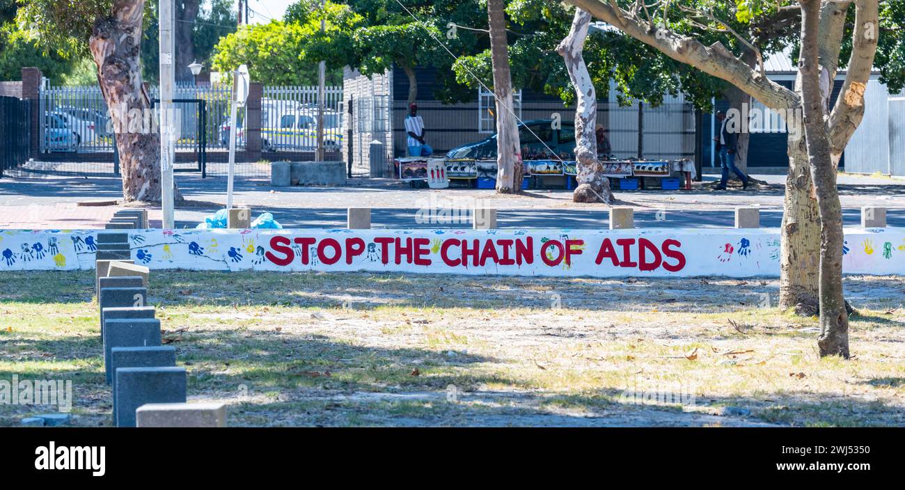 Township settlement area Langa near Cape Town and text on the wall stop ...