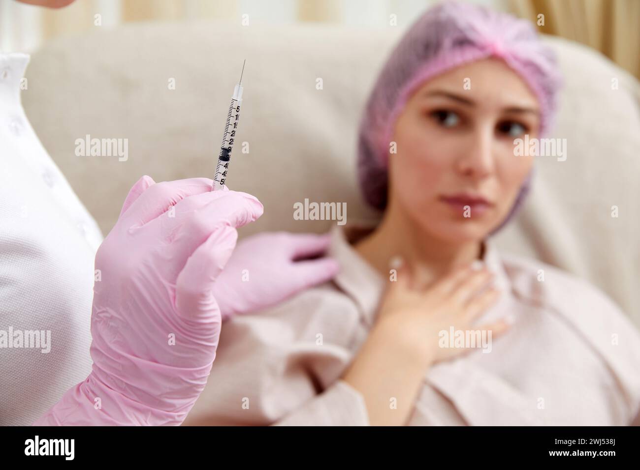 Cosmetologist performs the lift procedure by injecting beauty ...